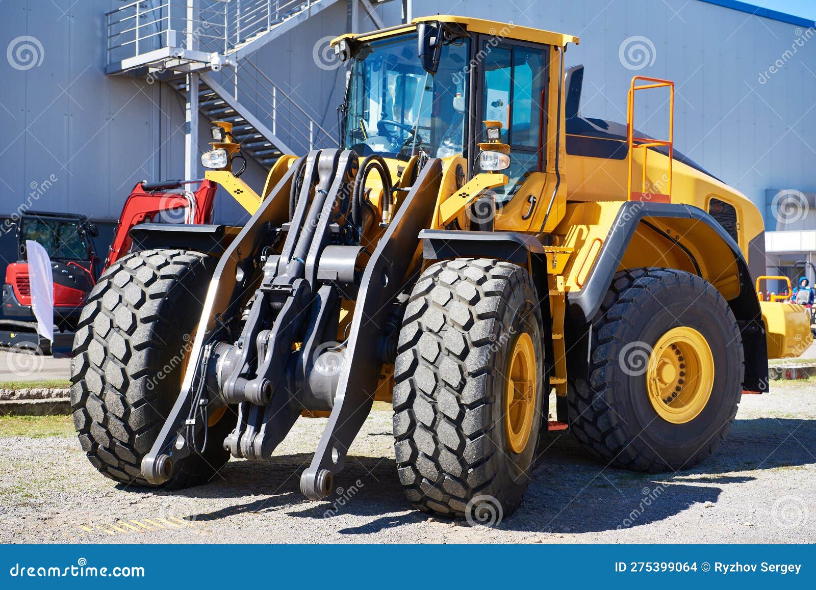 New wheel loader trucks stock photo. Image of works - 275399064