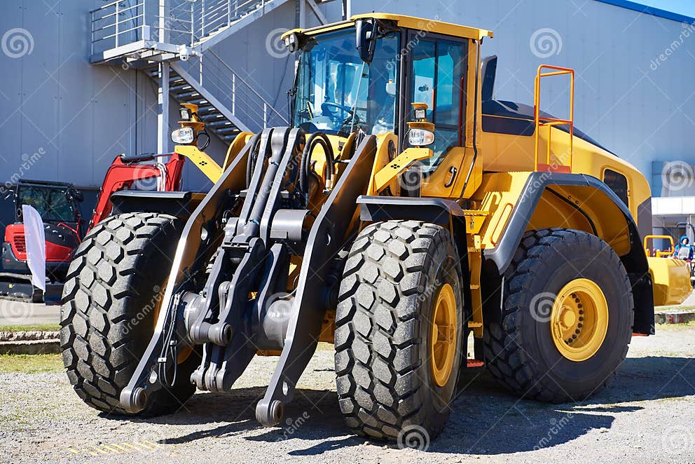 New wheel loader trucks stock photo. Image of works - 275399064