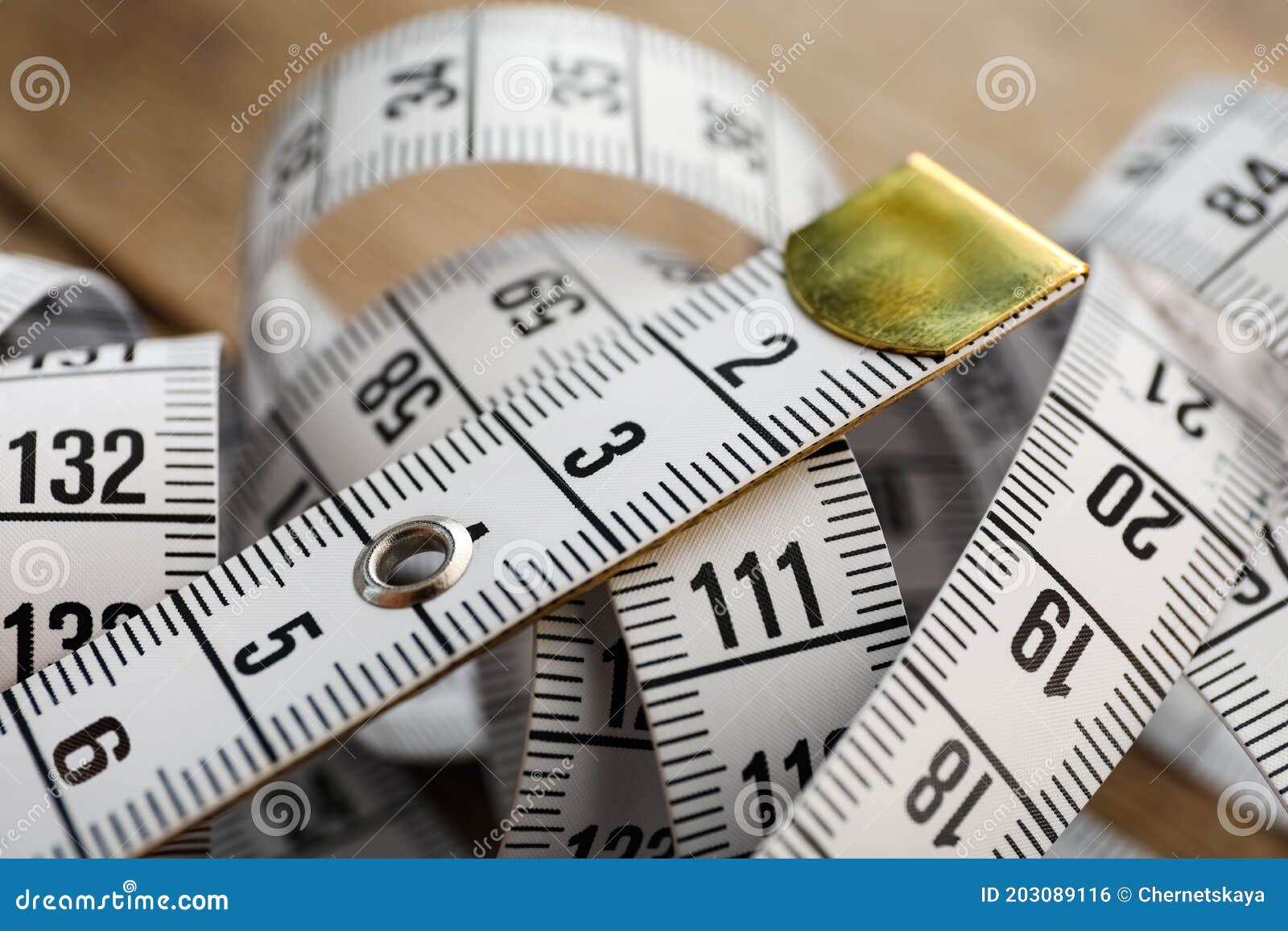 New White Measuring Tape on Table, Closeup Stock Photo - Image of ...