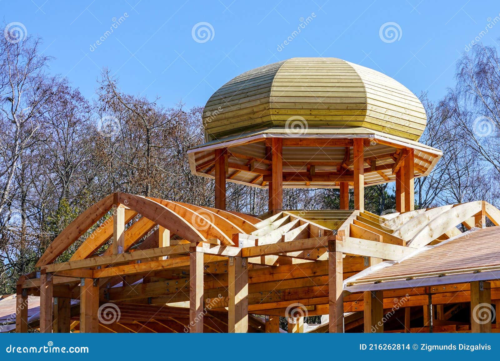 New Wooden Building Frame with a Round Domed Tower Stock Photo - Image ...