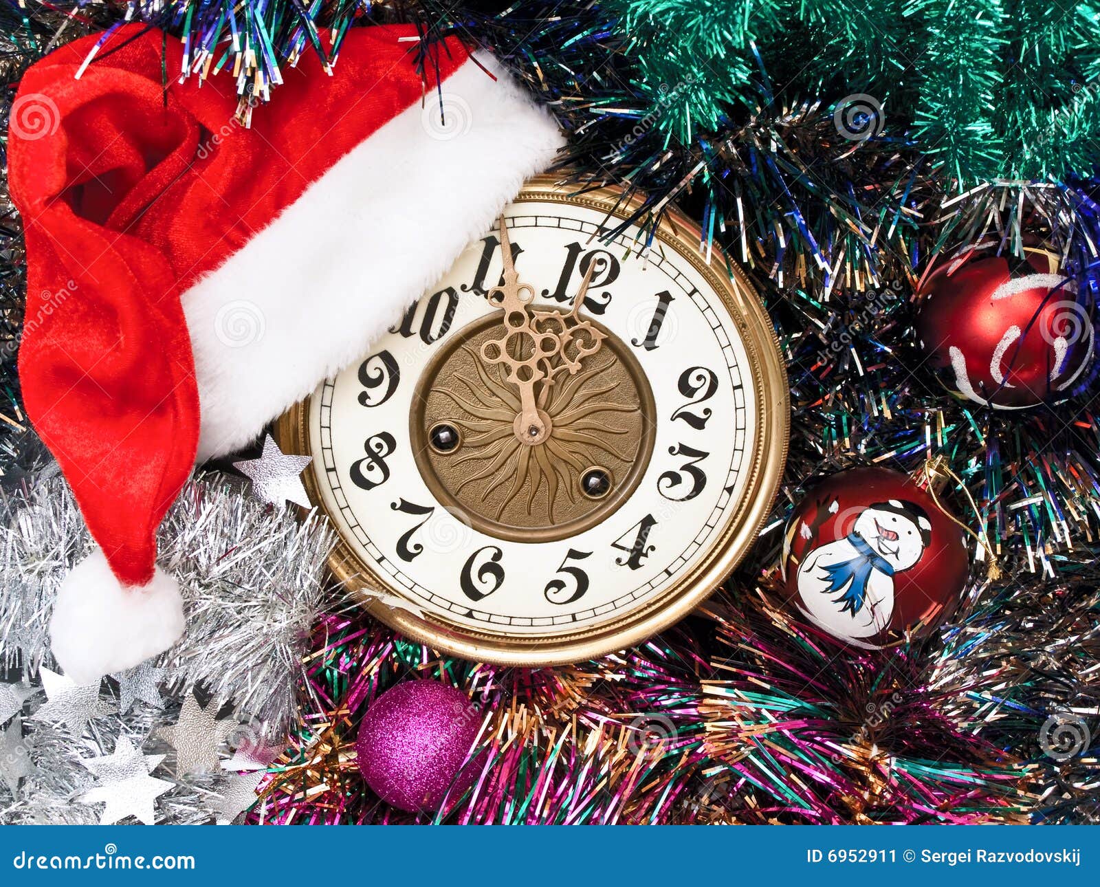 New year clock in red hat stock image. Image of decorative - 6952911