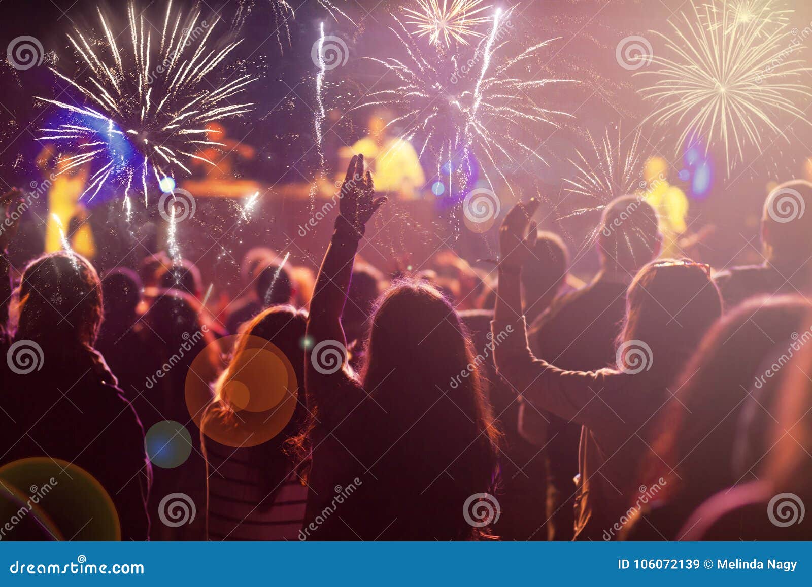 New Year Concept - Cheering Crowd and Fireworks Stock Image - Image of ...