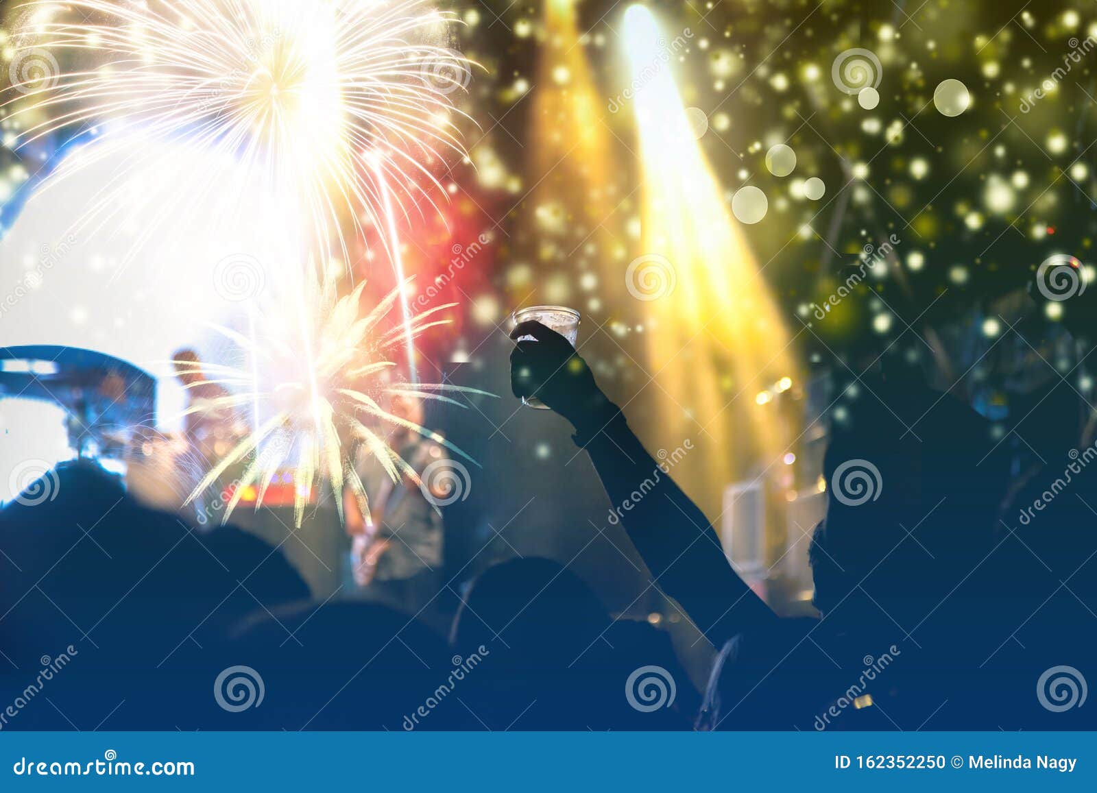 New Year Concept - Cheering Crowd and Fireworks Stock Photo - Image of ...