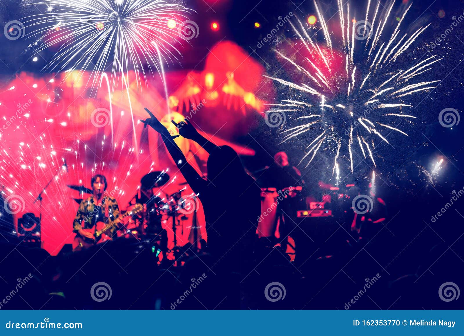 New Year Concept - Cheering Crowd and Fireworks Stock Photo - Image of ...
