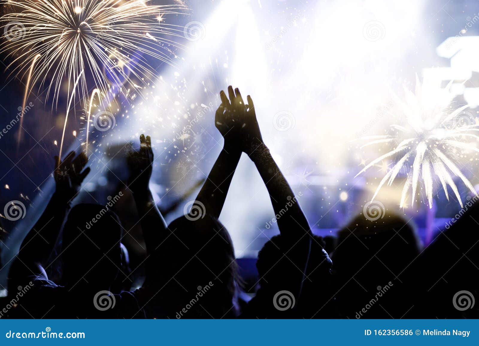New Year Concept - Cheering Crowd and Fireworks Stock Photo - Image of ...
