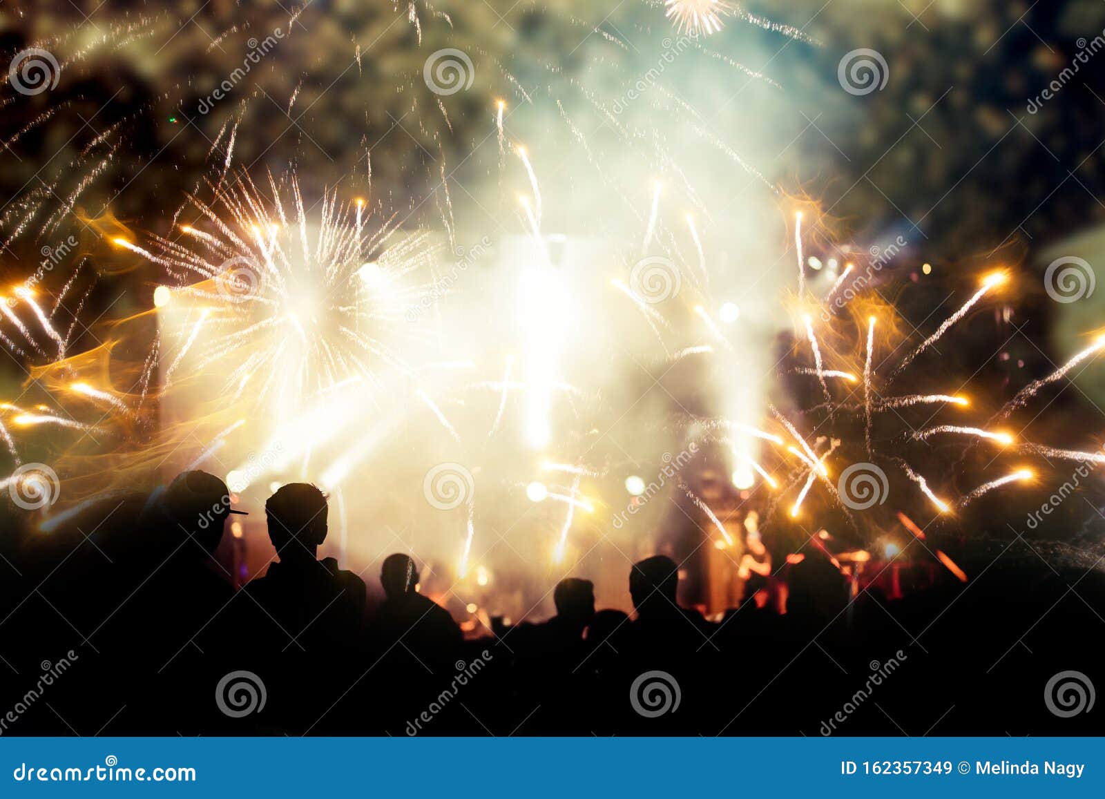 New Year Concept - Cheering Crowd and Fireworks Stock Image - Image of ...