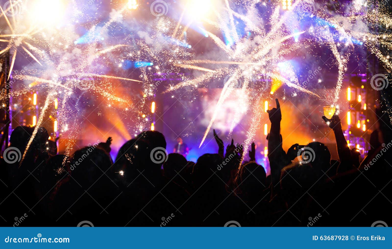 New Year Concept - Cheering Crowd and Fireworks Stock Photo - Image of ...