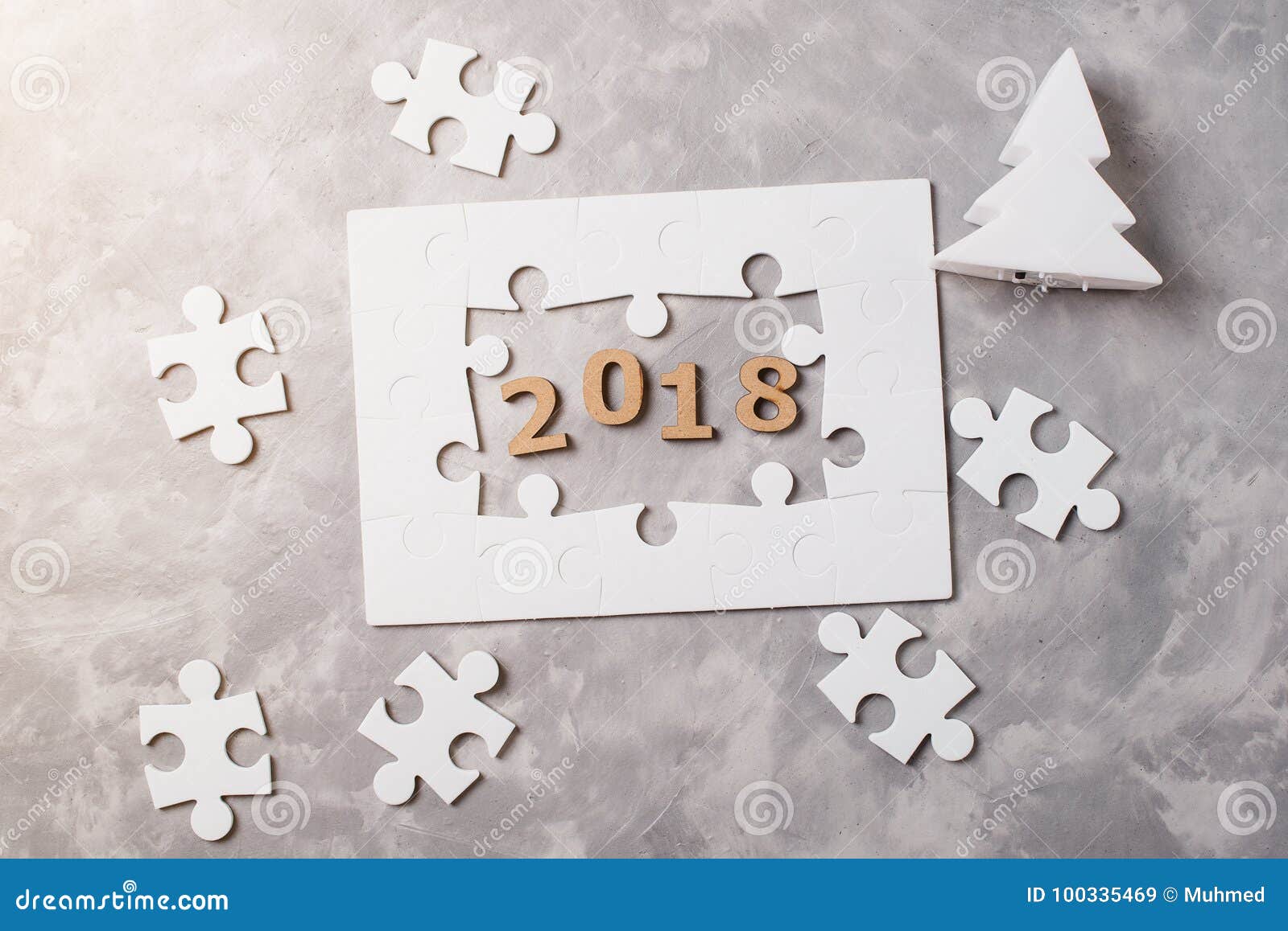 New Year Concept 2018. Jigsaw Puzzle on Grey Concrete Background. Stock ...