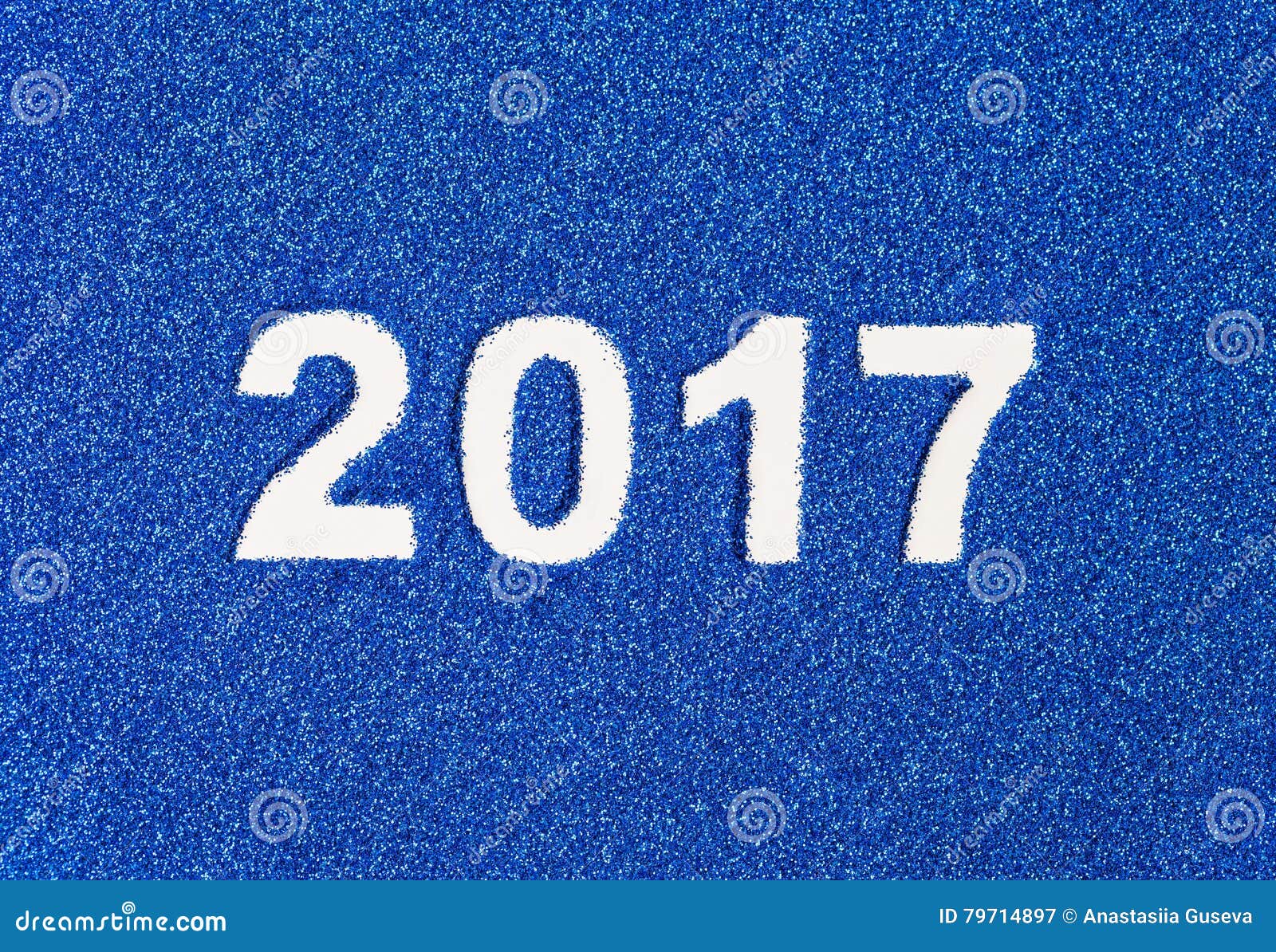 New Year Numbers 2017 Written on Background of Blue Glittering Sequins ...
