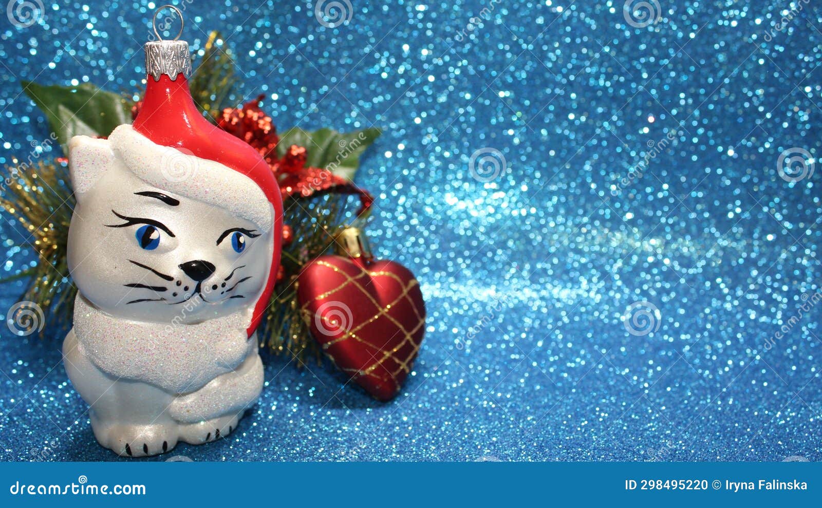 New Year S Composition with a Cat, Fir Branches and Cones on a Blue ...