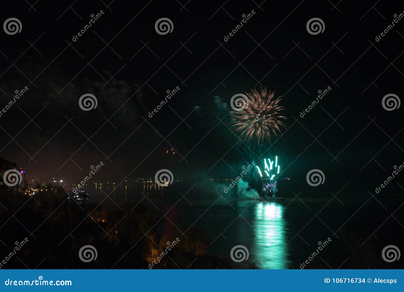 New Year`s Eve Fireworks Launched from the Water with Reflections Stock ...