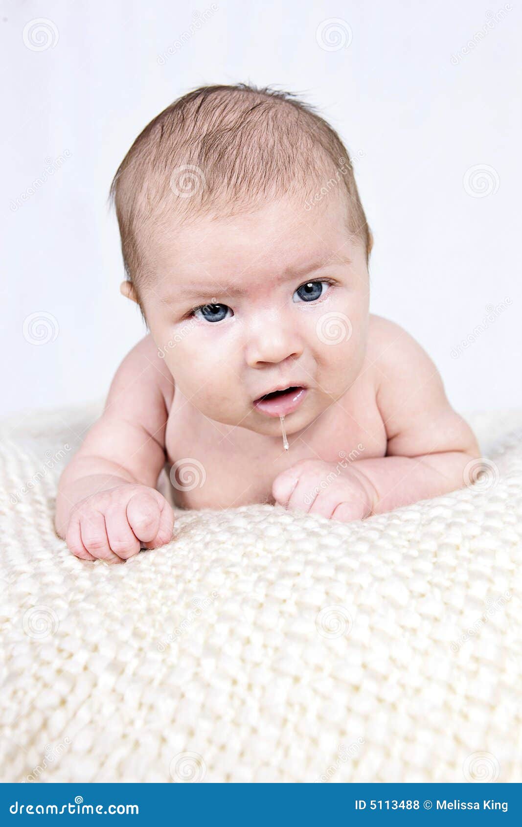 Newborn Baby on Belly Looking Up Stock Photo - Image of closeups ...