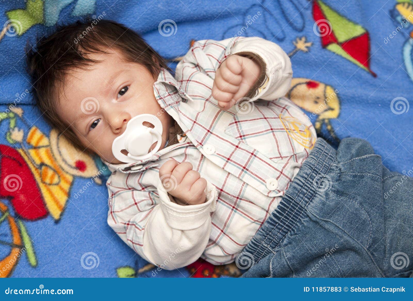 Newborn Baby Boy with Pacifier Stock Image - Image of colorful, bonnie ...