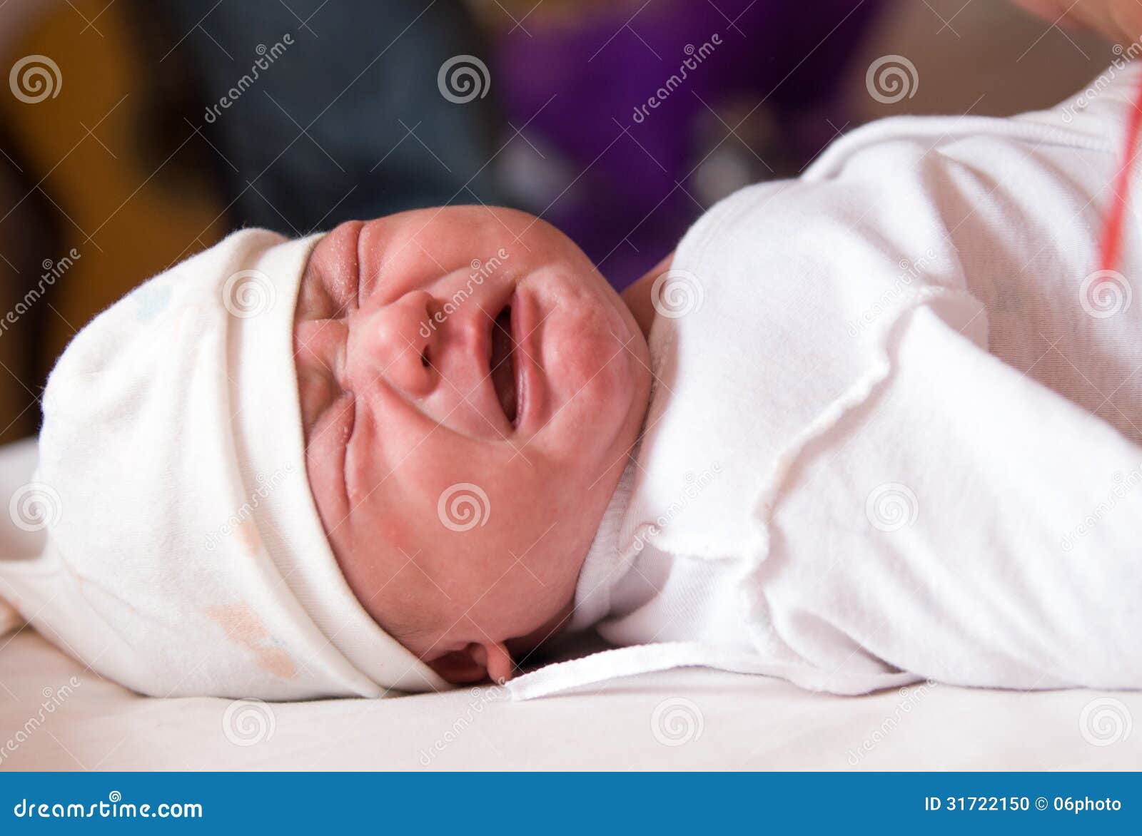 Newborn Baby Crying On The Bed Stock Photo - Image: 31722150