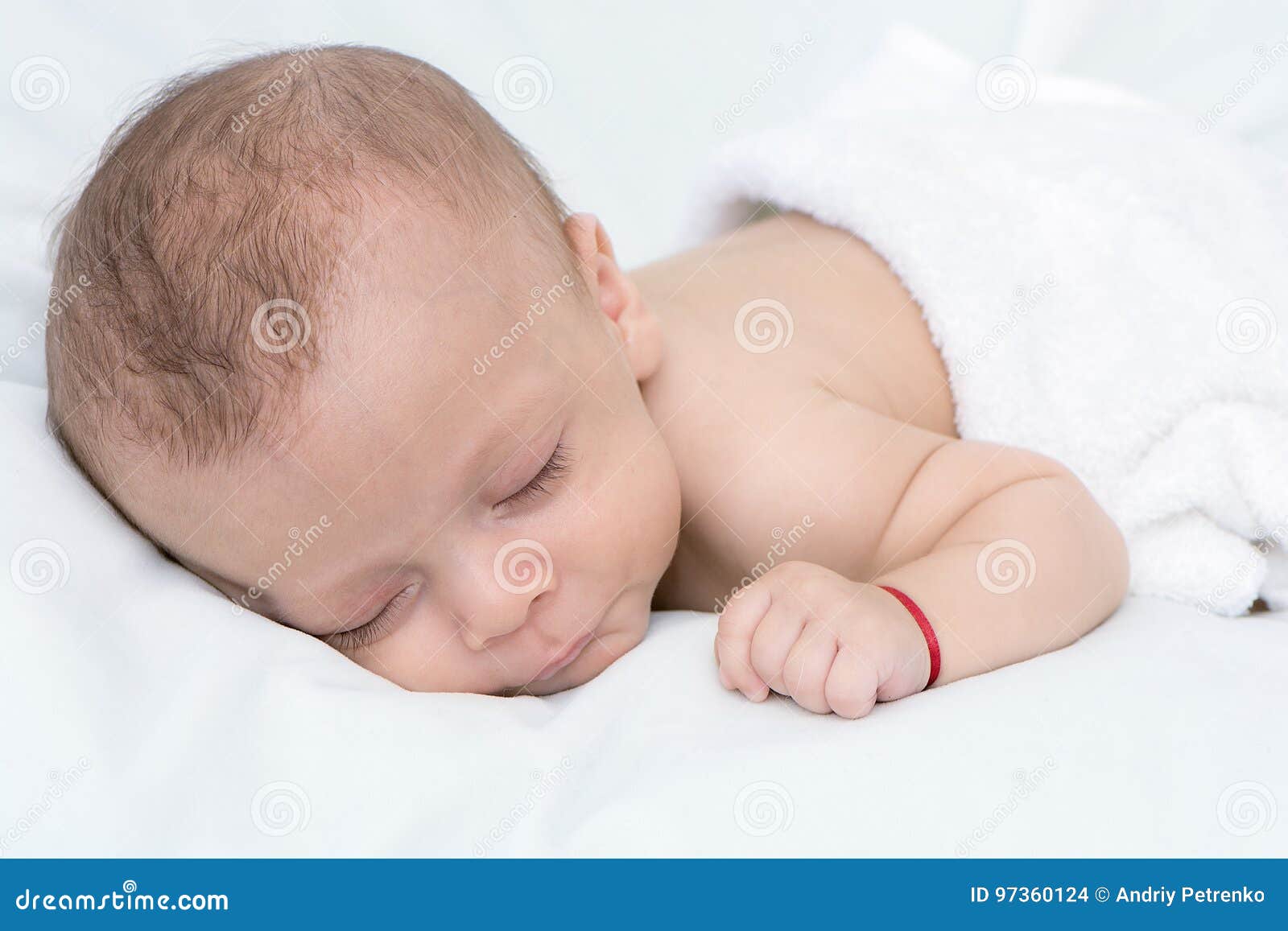 Newborn Baby Curled Up Sleeping on a Blanket Stock Photo - Image of ...