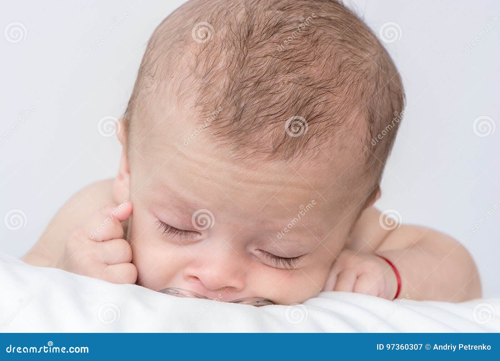Newborn Baby Curled Up Sleeping on a Blanket Stock Image - Image of ...