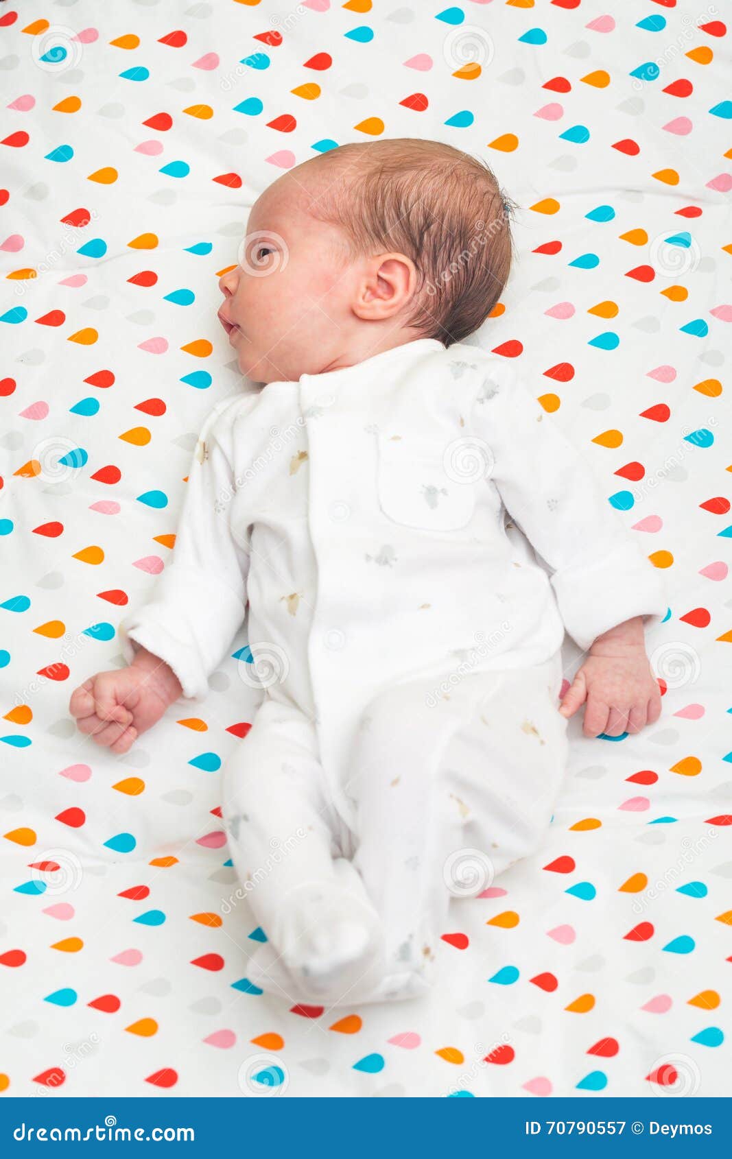 Newborn Baby Dressed in White Sleeping on Her Back Stock Image - Image ...