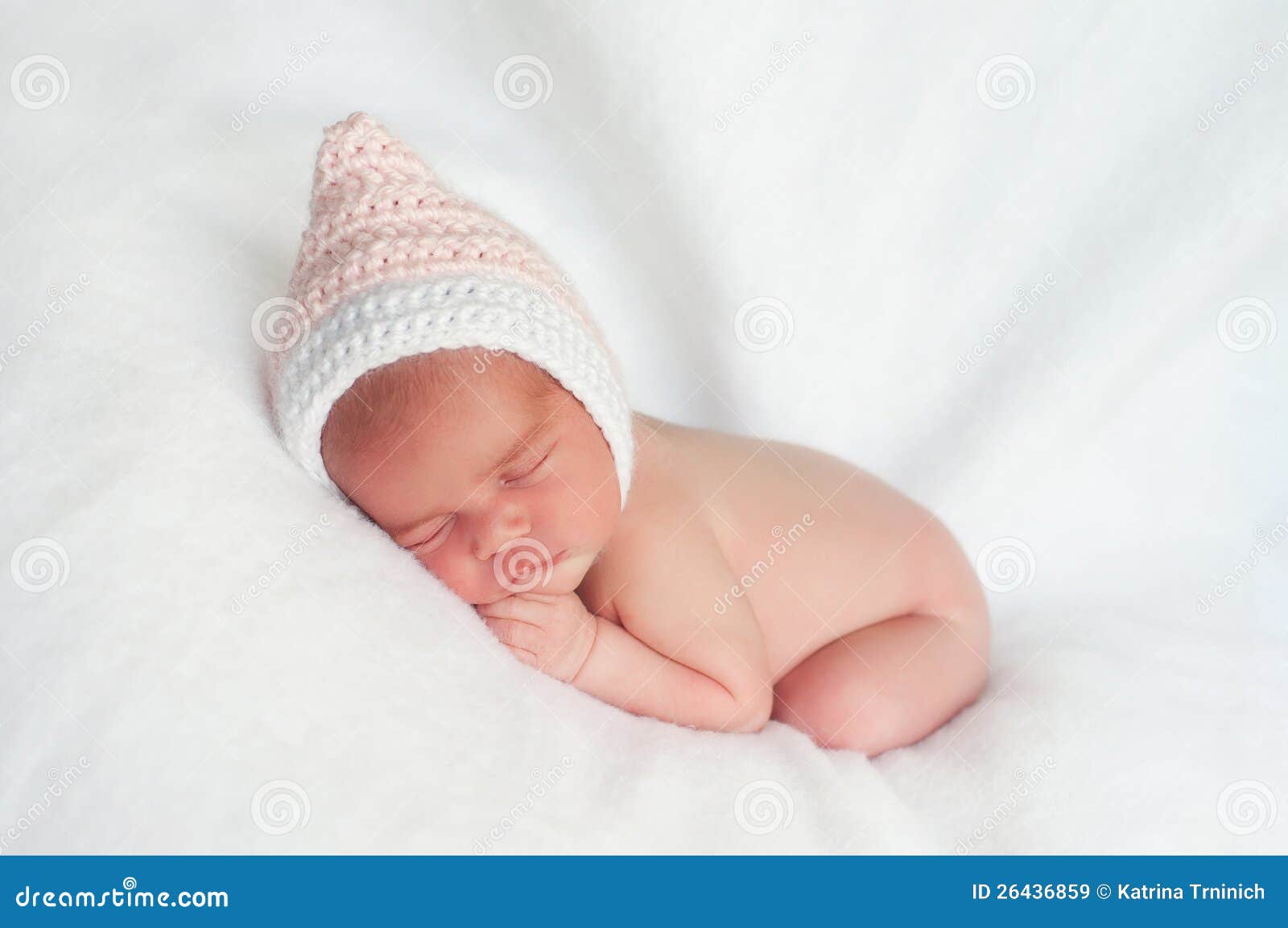 Newborn Baby Girl Wearing Pink and White Pixie Hat Stock Image - Image ...