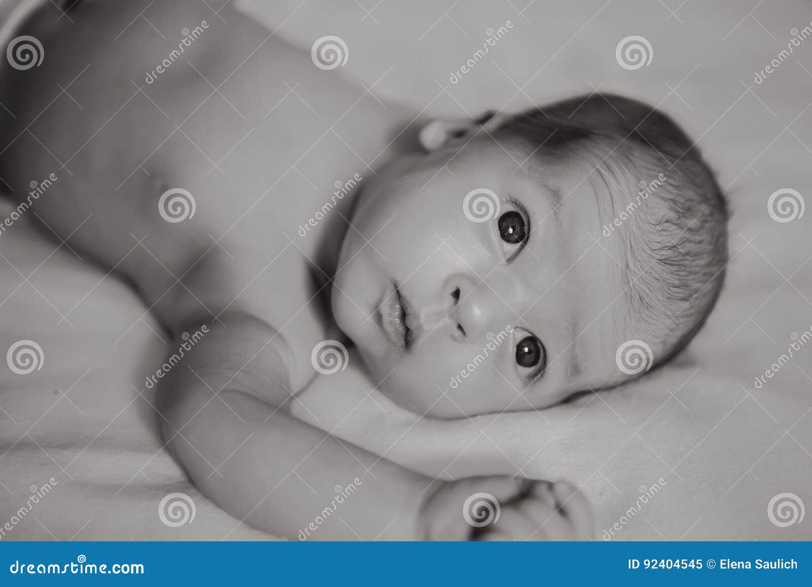 Newborn Baby Looking at Camera on Bed Stock Image - Image of childhood ...