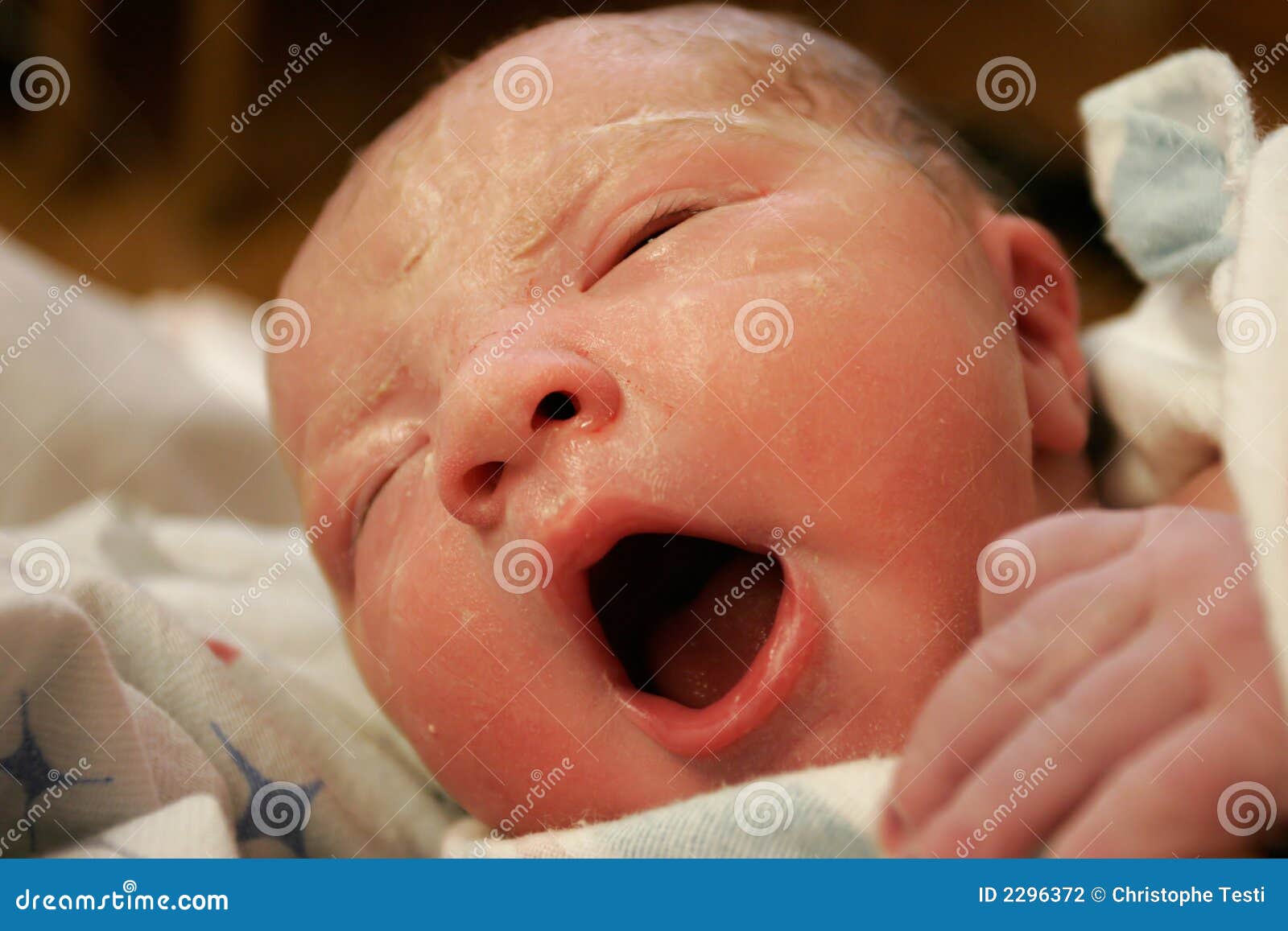 Newborn Crying While Mother Holding In Bedroom Royalty-Free Stock ...