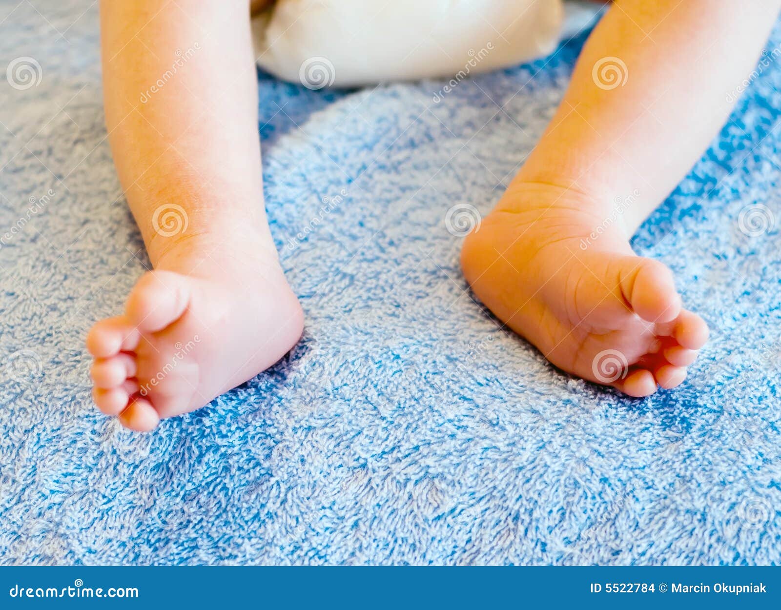Newborn s legs stock photo. Image of female, holding, beautiful - 5522784