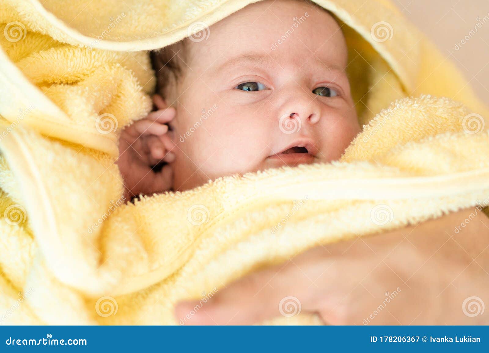 Newborn after Taking a Bath. Little Baby Wrapped in Towel Stock Image ...