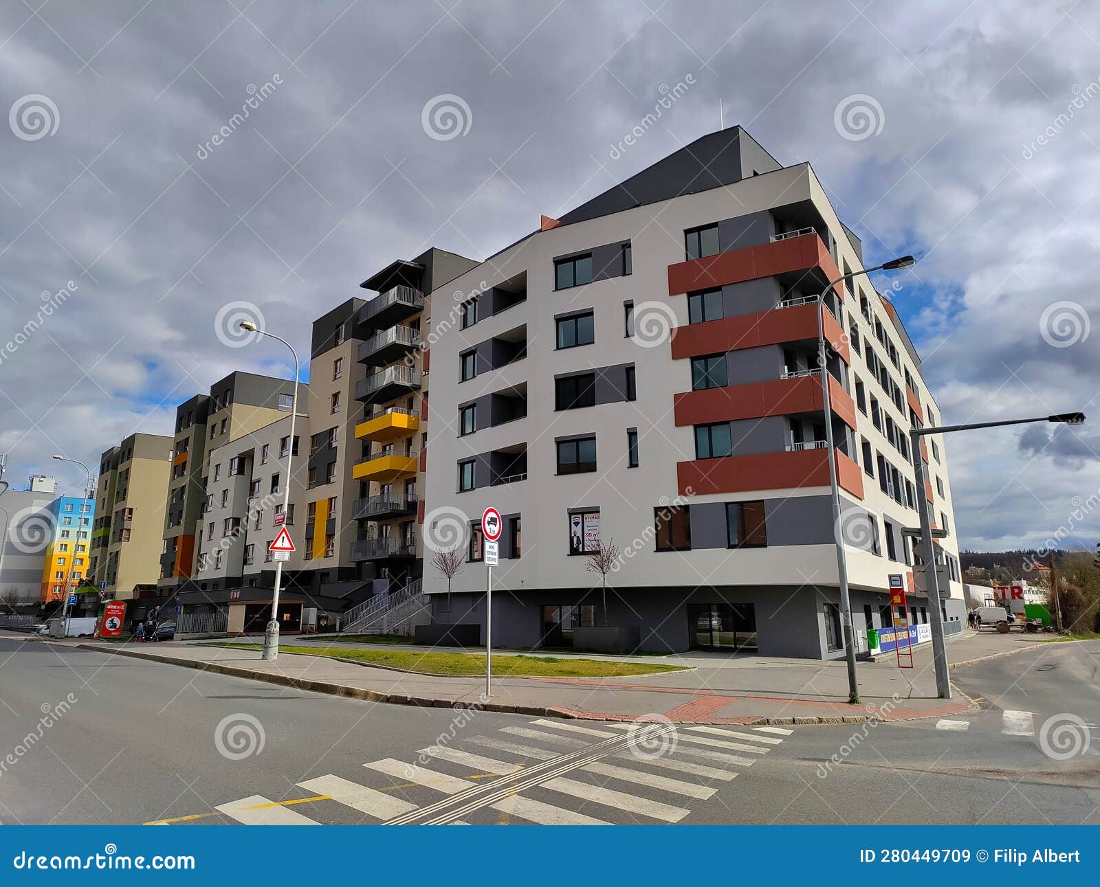 Newly Constructed Apartment Building With White And Brown Facade ... Newly Constructed Apartment Building With White And Brown Facade ...