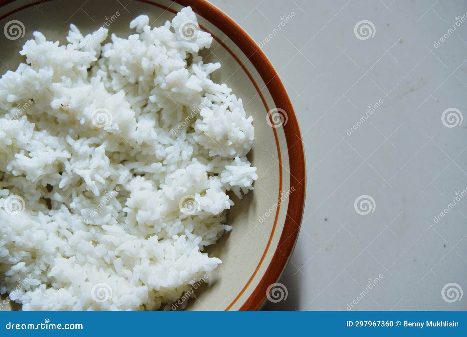 Newly Cooked Rice is Placed on a Plate with Copy Space on the Right ...
