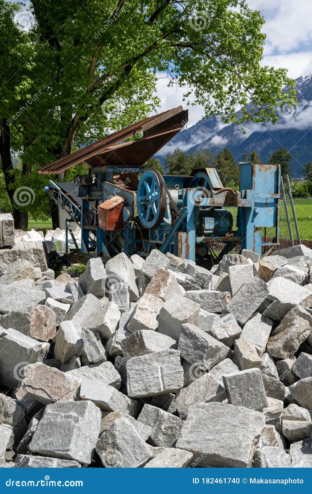 Cut Stones and Blocks with an Old Rock Cutting Machine in the ...