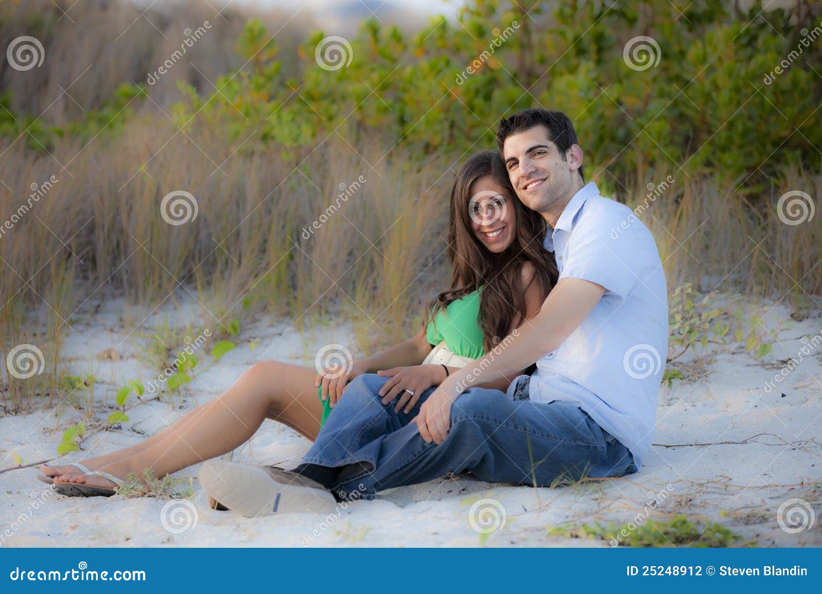Newly engaged couple stock photo. Image of people, coast - 25248912