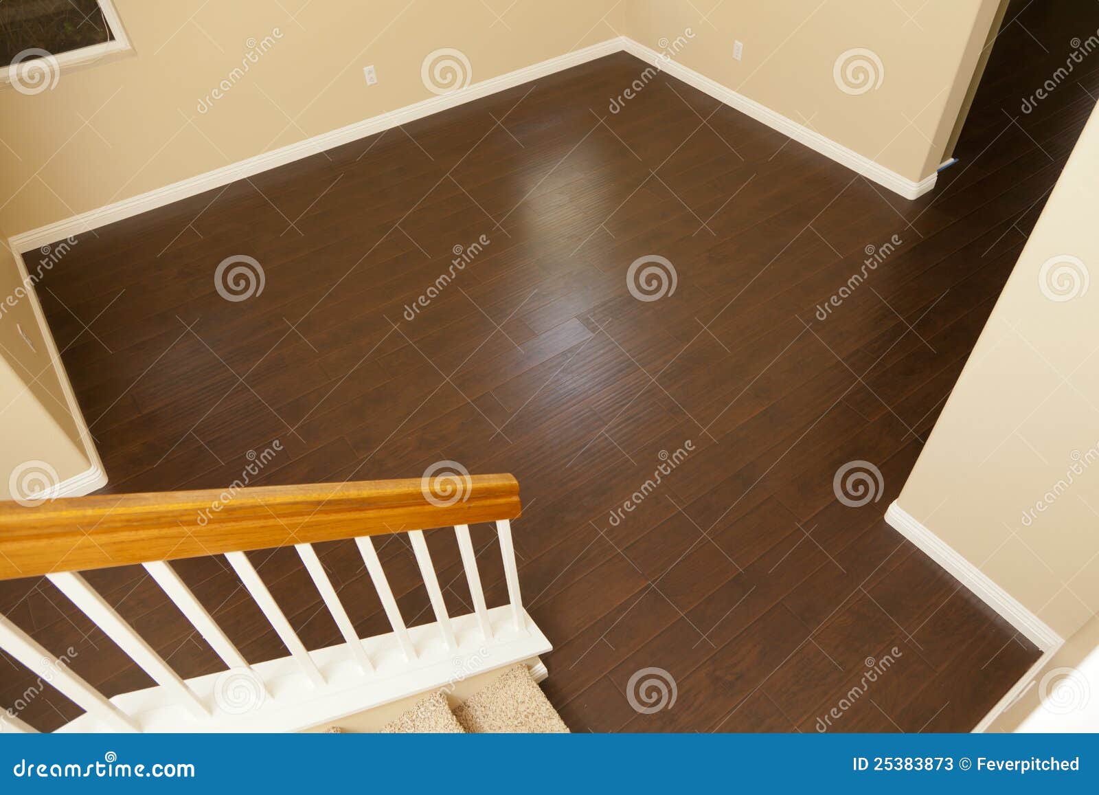 Newly Installed Brown Laminate Flooring and Baseboards in Home Stock ...