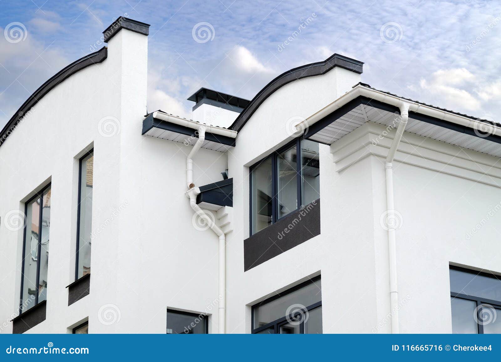 Newly Installed Construction Frame House Rain Gutter System on the Roof ...
