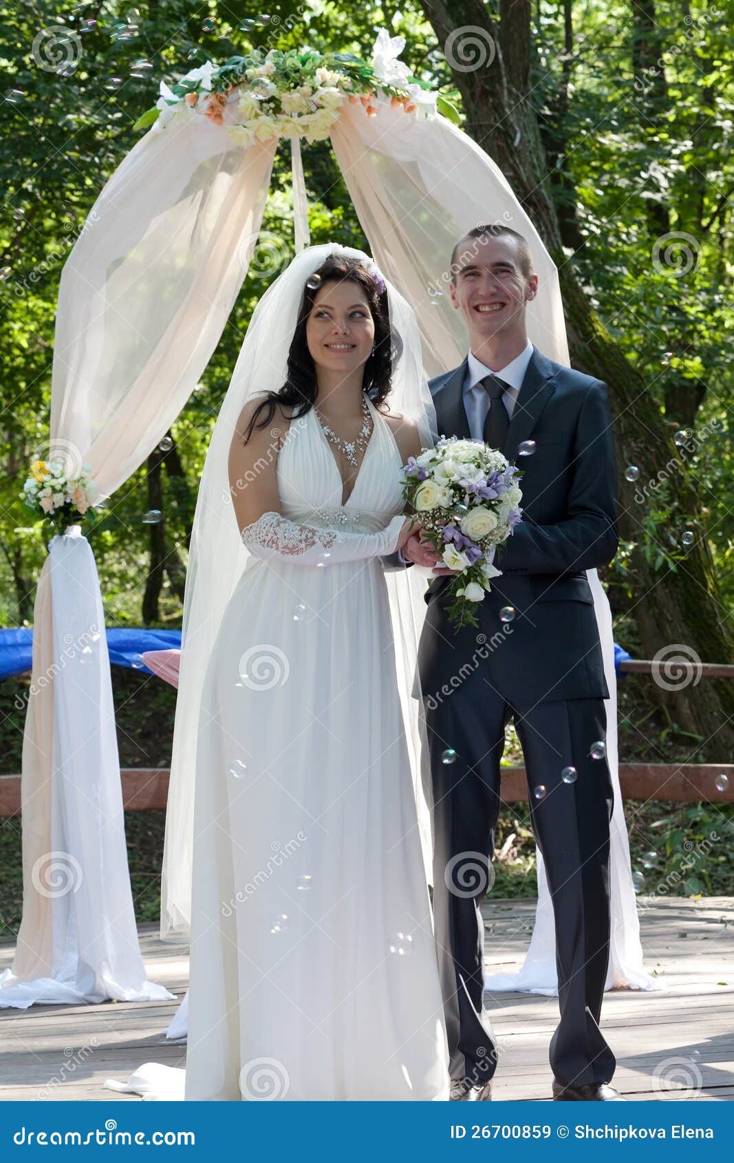 Newly-married couple stock image. Image of looking, lawn - 26700859