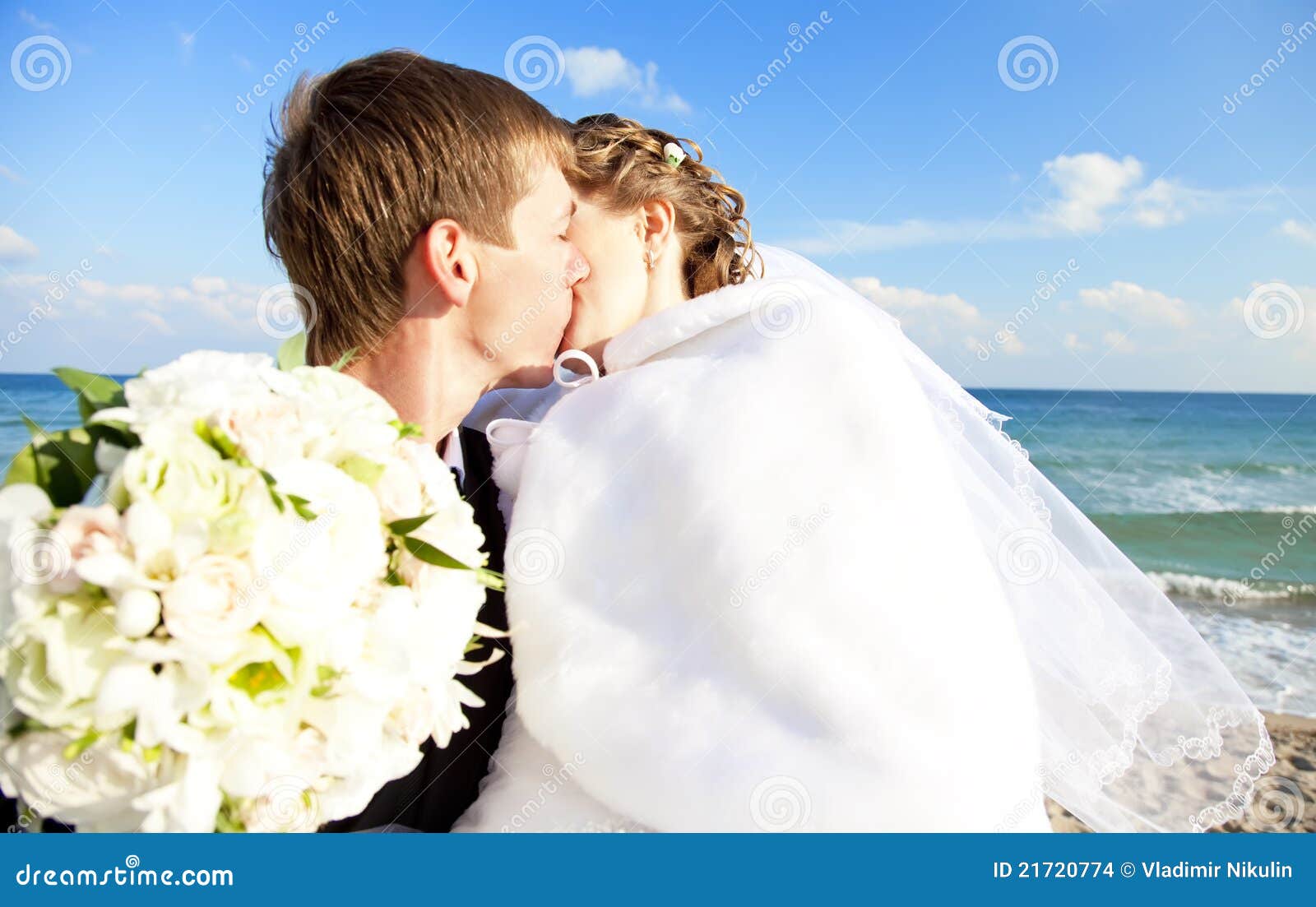 Newly Married Couple Kissing on the Beach. Stock Photo - Image of beach ...