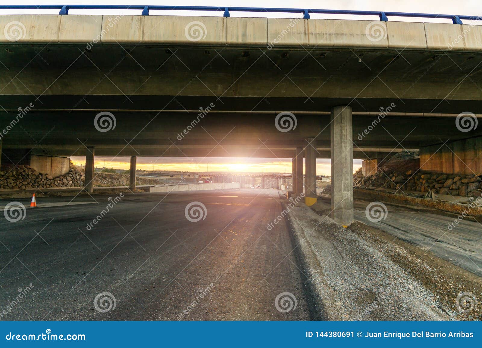Newly Paved Highway Under the Construction of a Bridge Stock Image ...