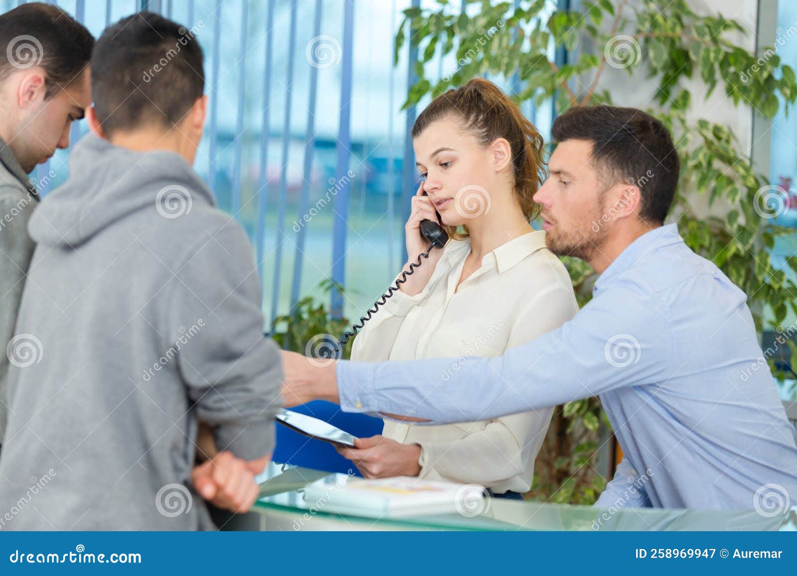 Newly Recruit Receptionist Handling Task Stock Image - Image of ...