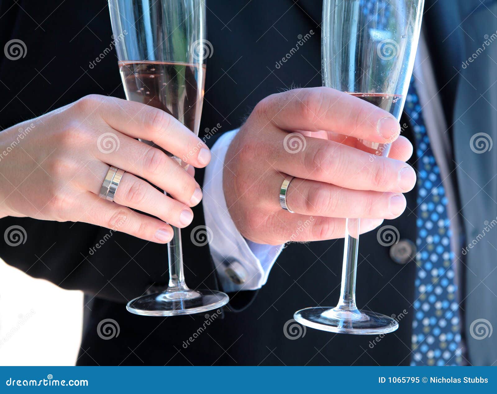 Newly Weds Hands with Wedding Rings and Champagne Stock Image - Image ...
