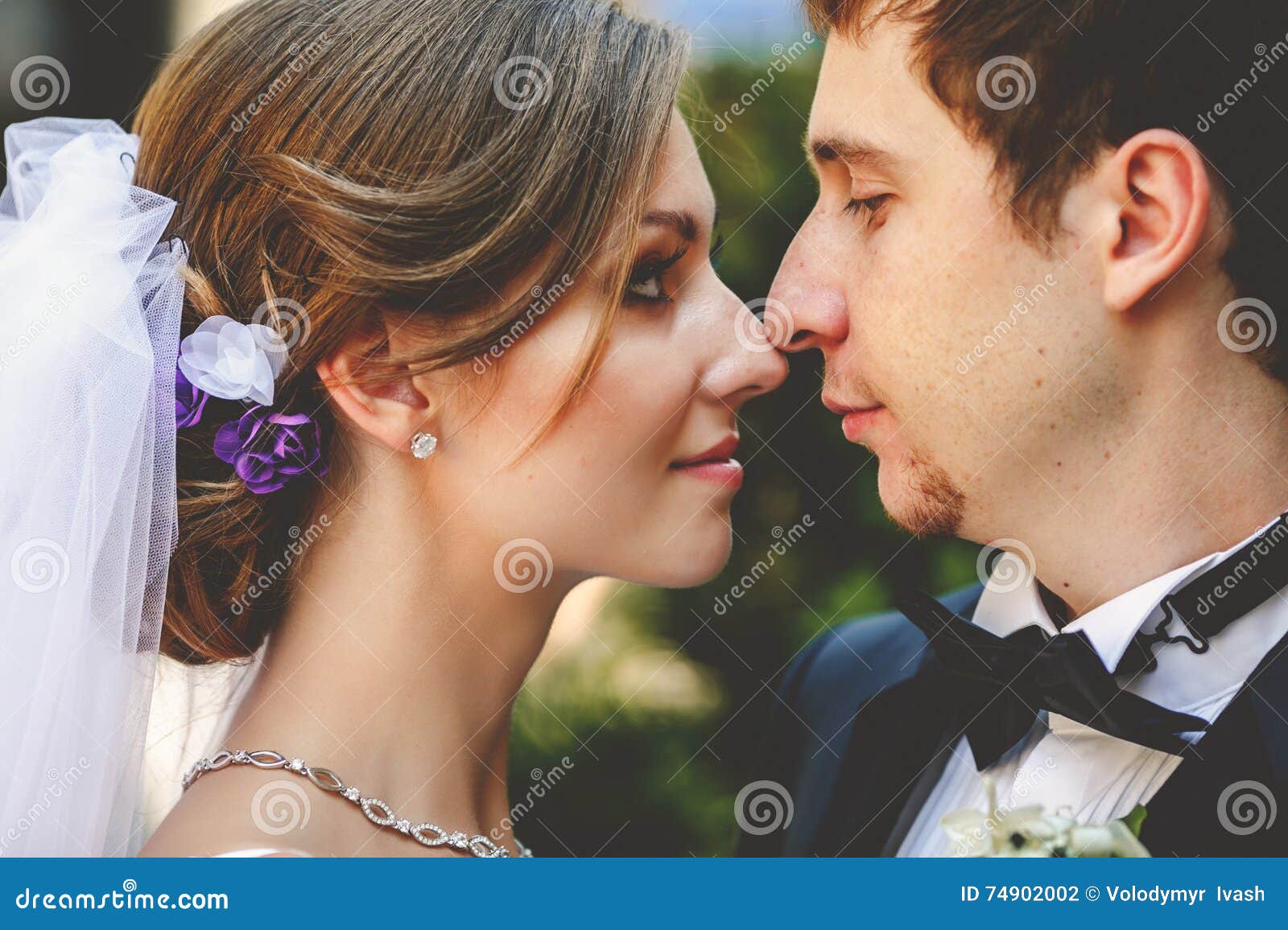 Newlyweds Smile Standing on a Kiss Place Stock Photo - Image of ...