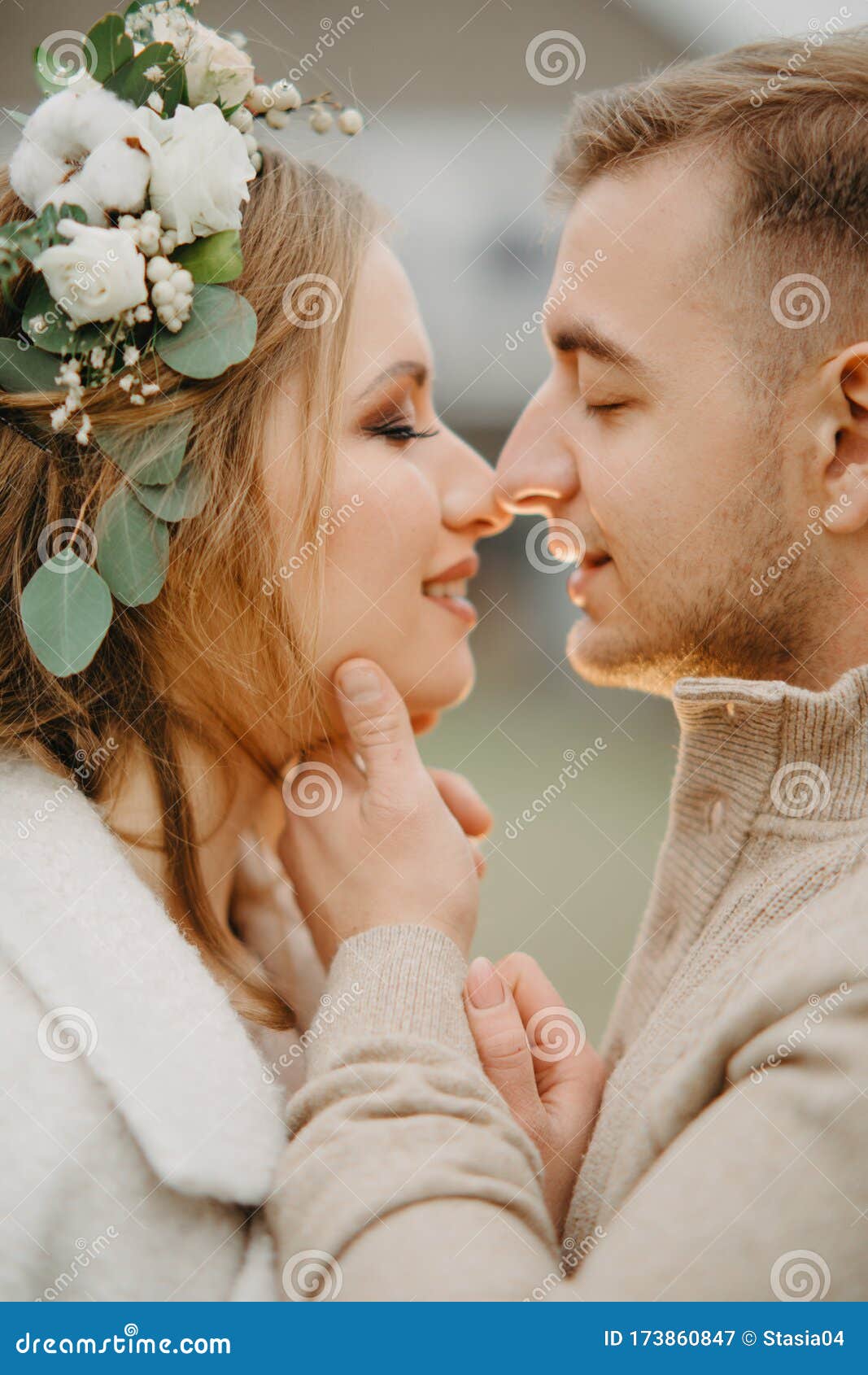 Newlyweds Stand and Embrace Stock Image - Image of happy, flower: 173860847