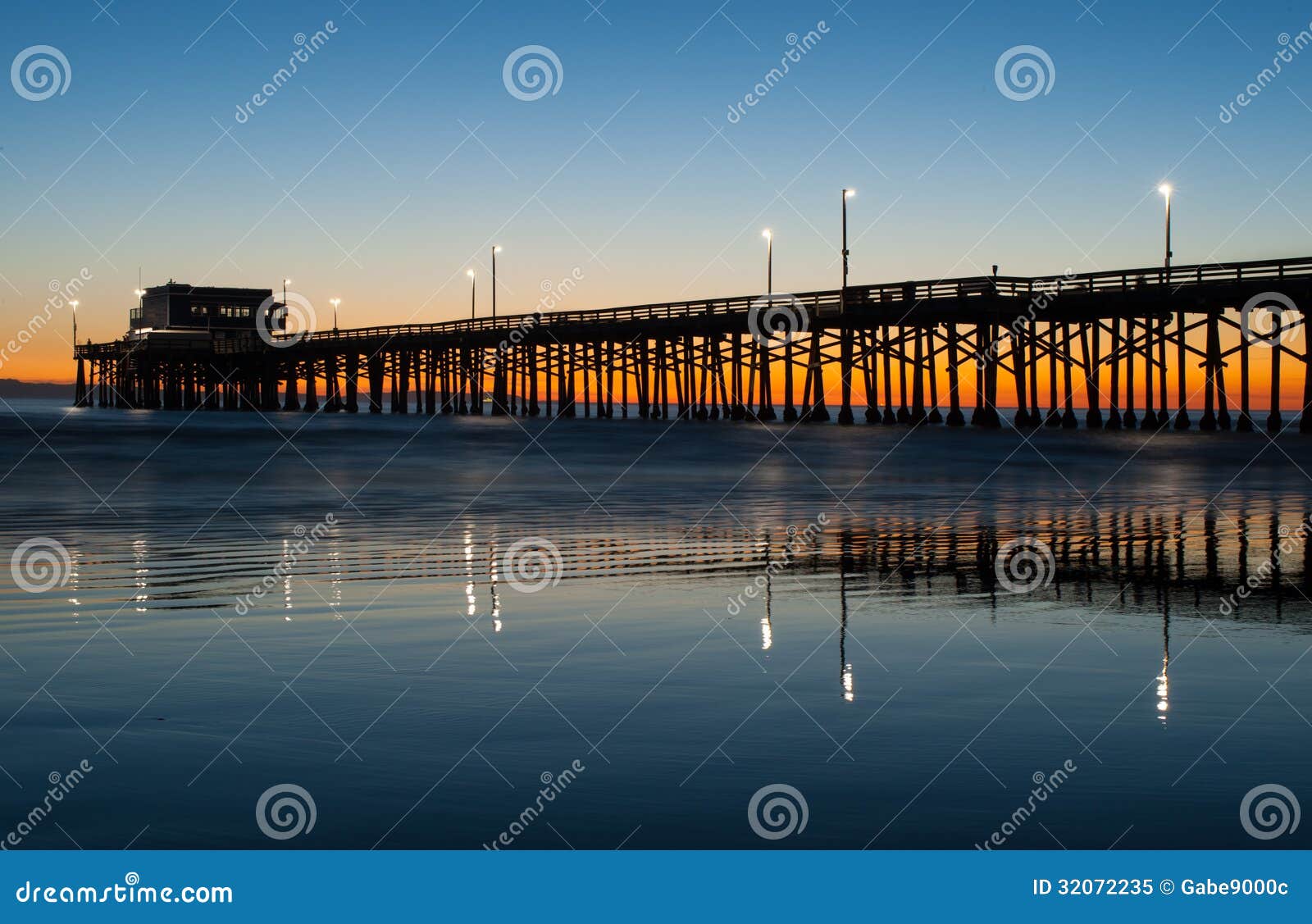 Newport beach pier sunset stock image. Image of sunset - 32072235