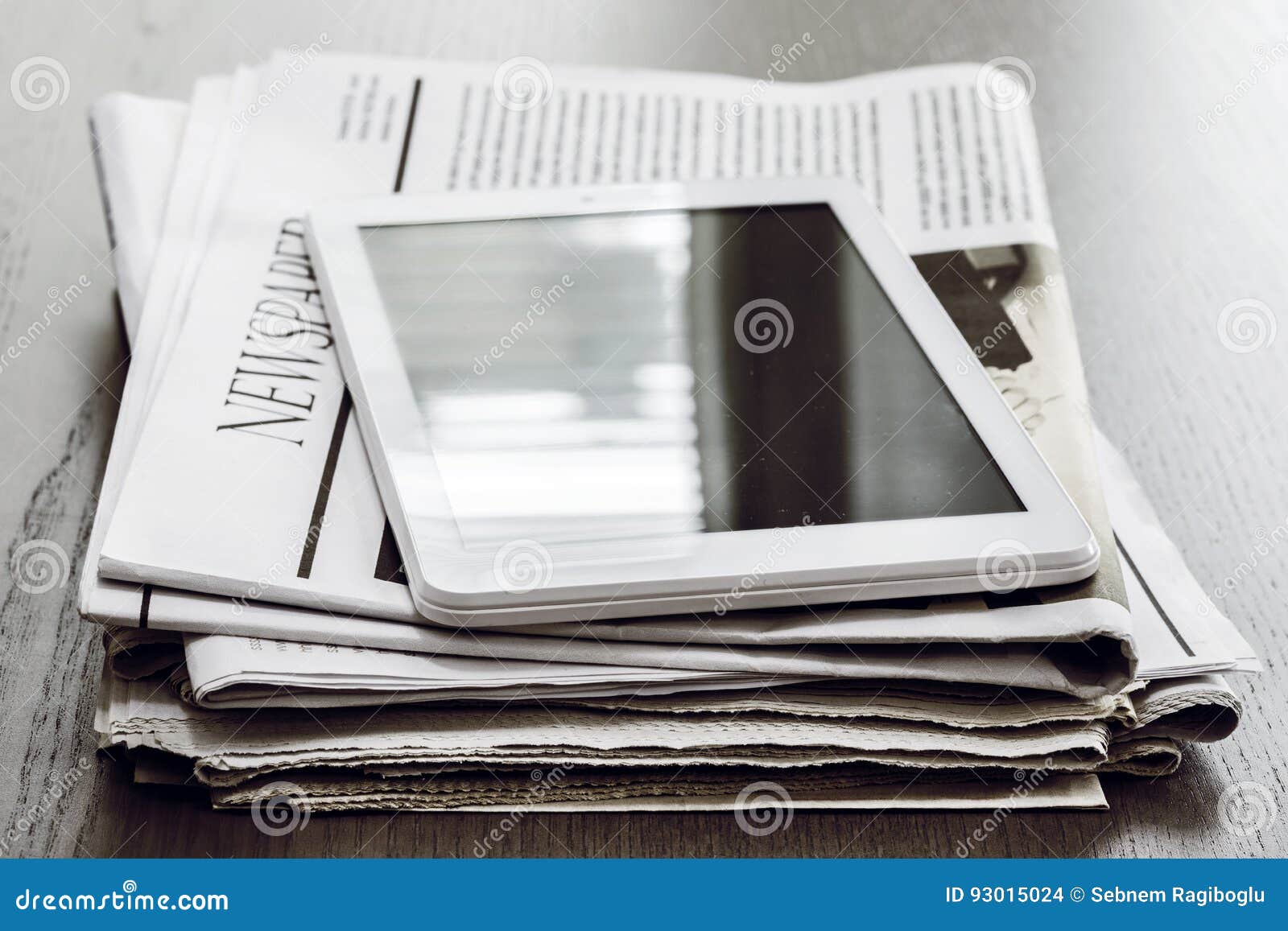 Newspaper and Digital Tablet on Wooden Table Stock Photo - Image of ...