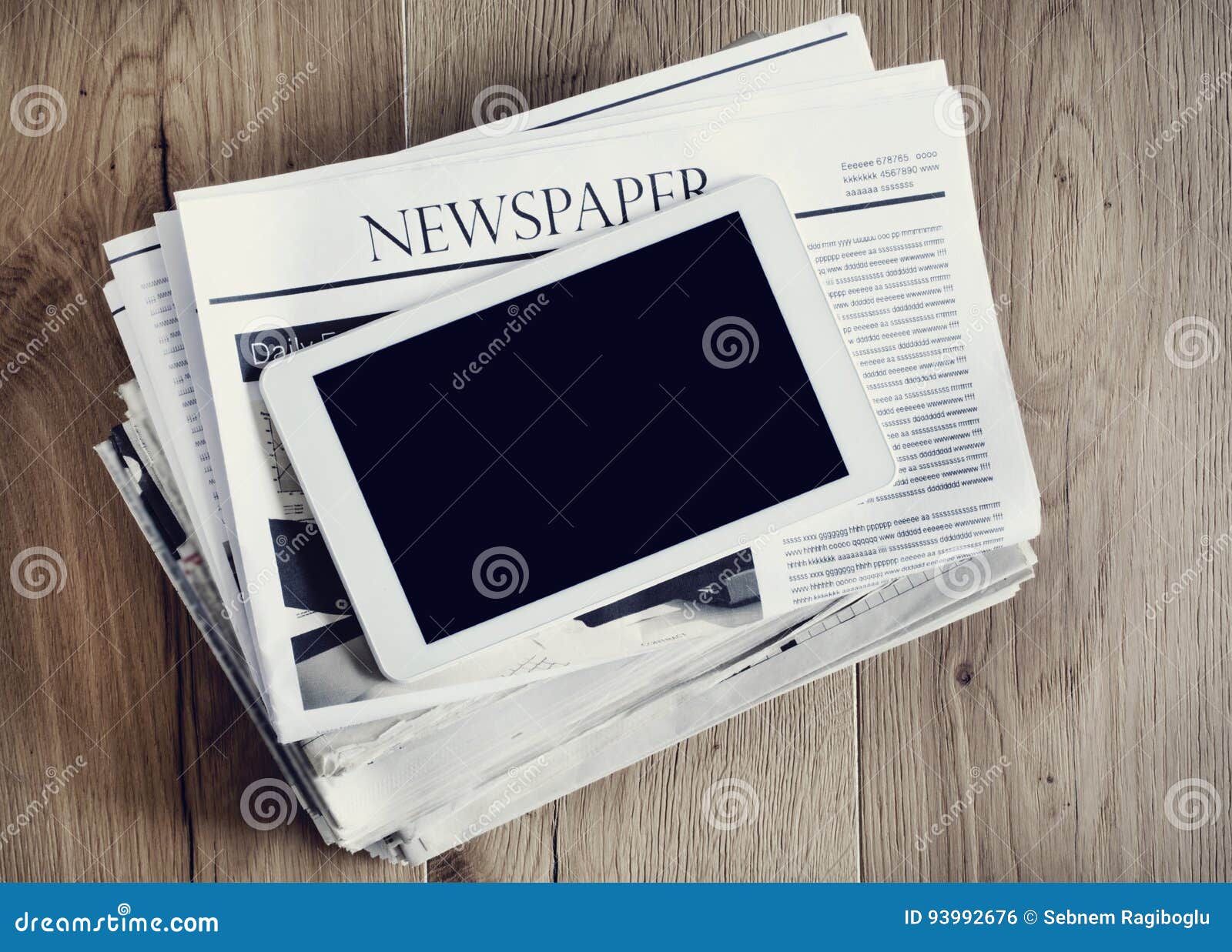 Newspaper with Digital Tablet on Wooden Table Stock Photo - Image of ...