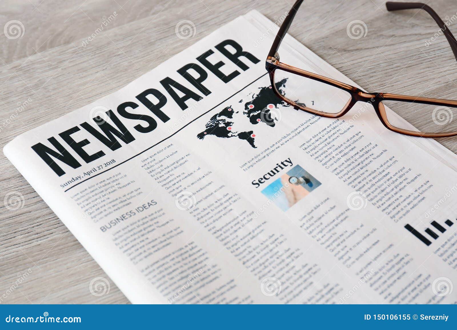 Newspaper with Glasses on Wooden Background Stock Image - Image of ...