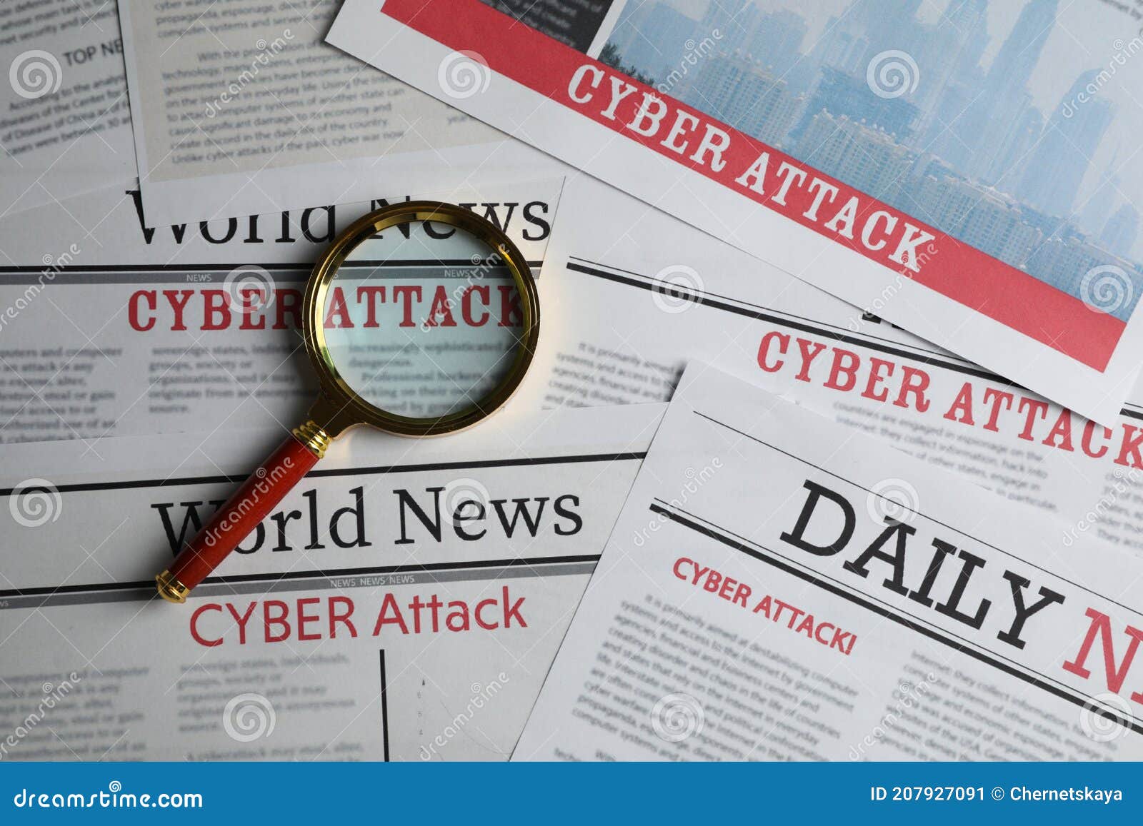 Newspaper with Headline CYBER ATTACK and Magnifying Glass, Top View ...