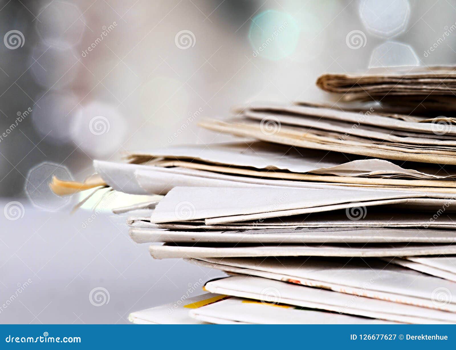 Newspaper Piled Up on a Table Stock Image - Image of information ...