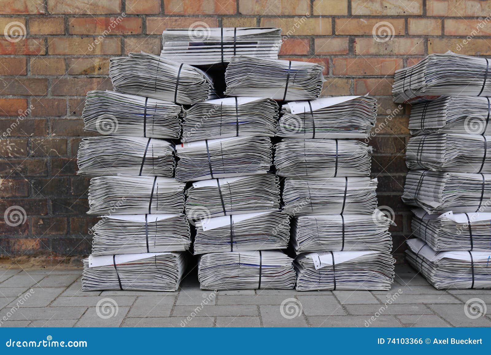 Newspaper stack on street stock photo. Image of piled - 74103366