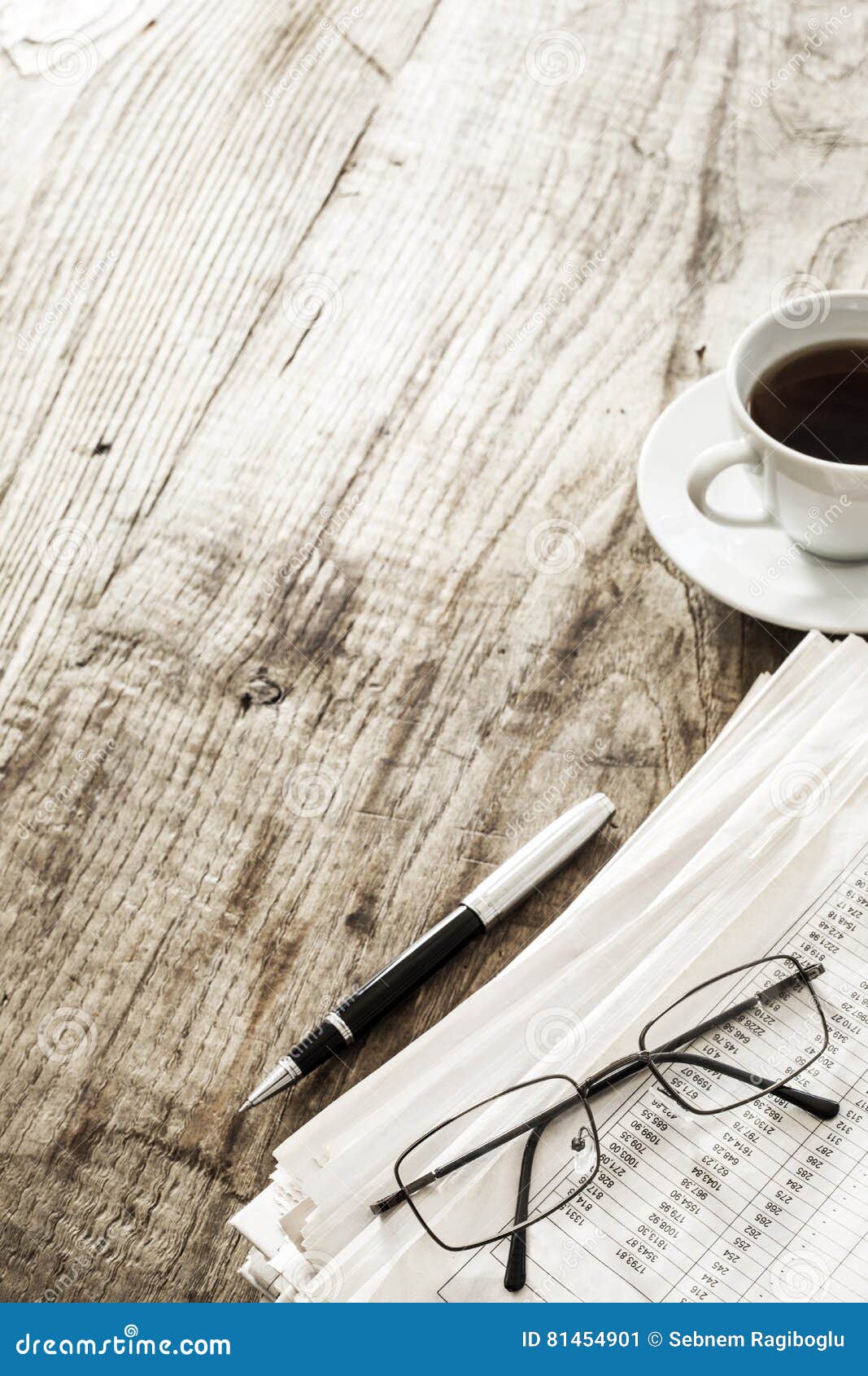 Newspaper on wooden table stock image. Image of close - 81454901