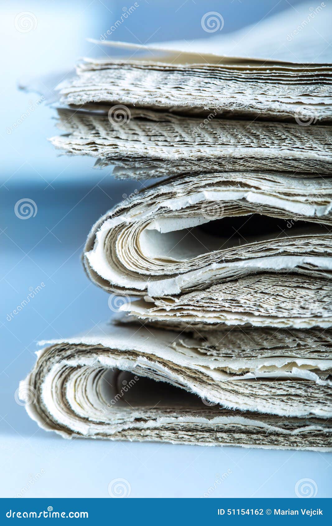 Newspapers Folded and Stacked on the Table Stock Photo - Image of ...