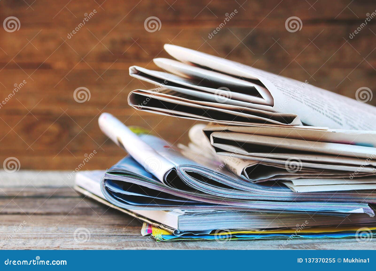 Newspapers and Magazines on Old Wood Background. Stock Image - Image of ...