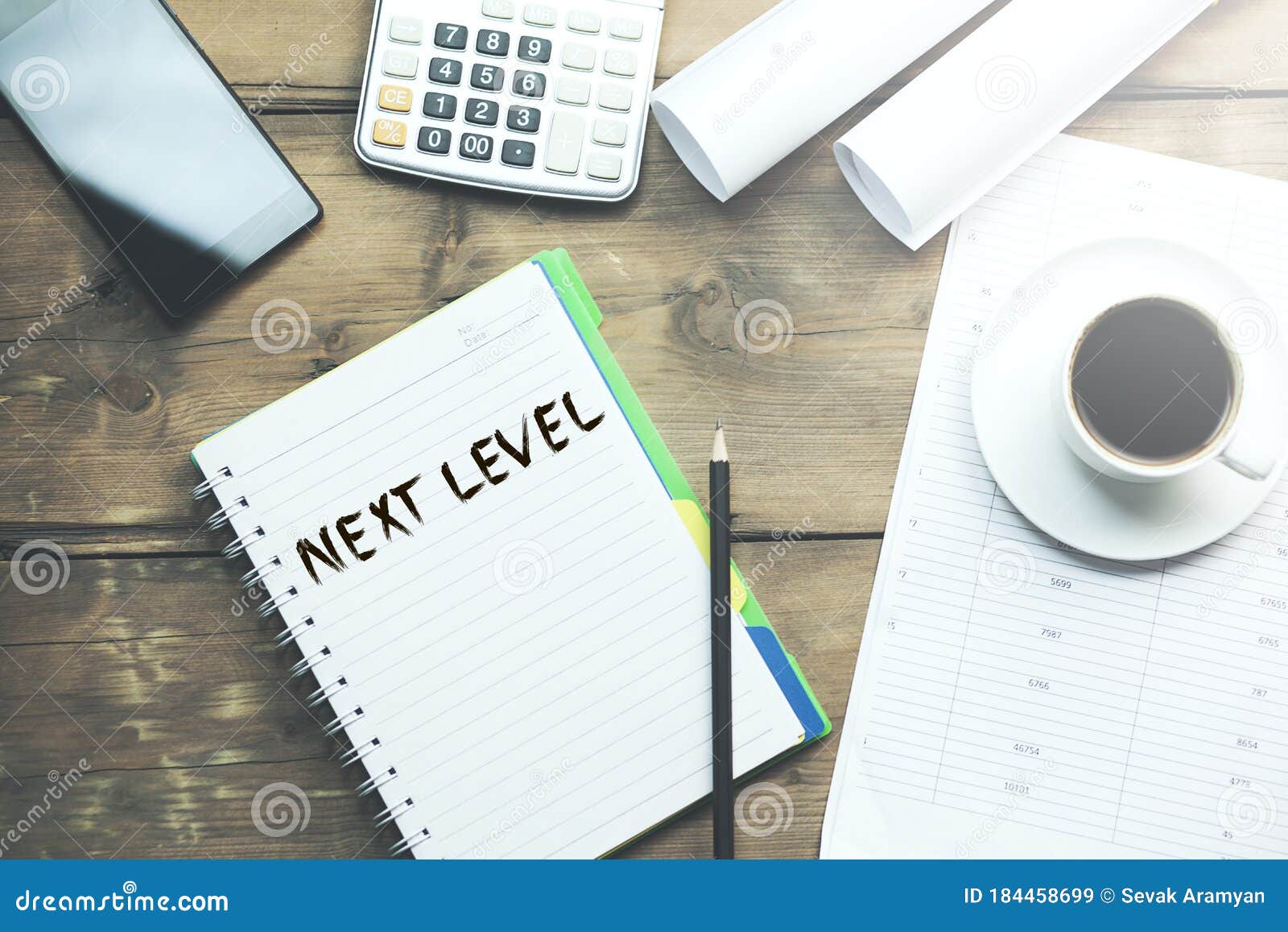 Next level text on notepad stock image. Image of level - 184458699